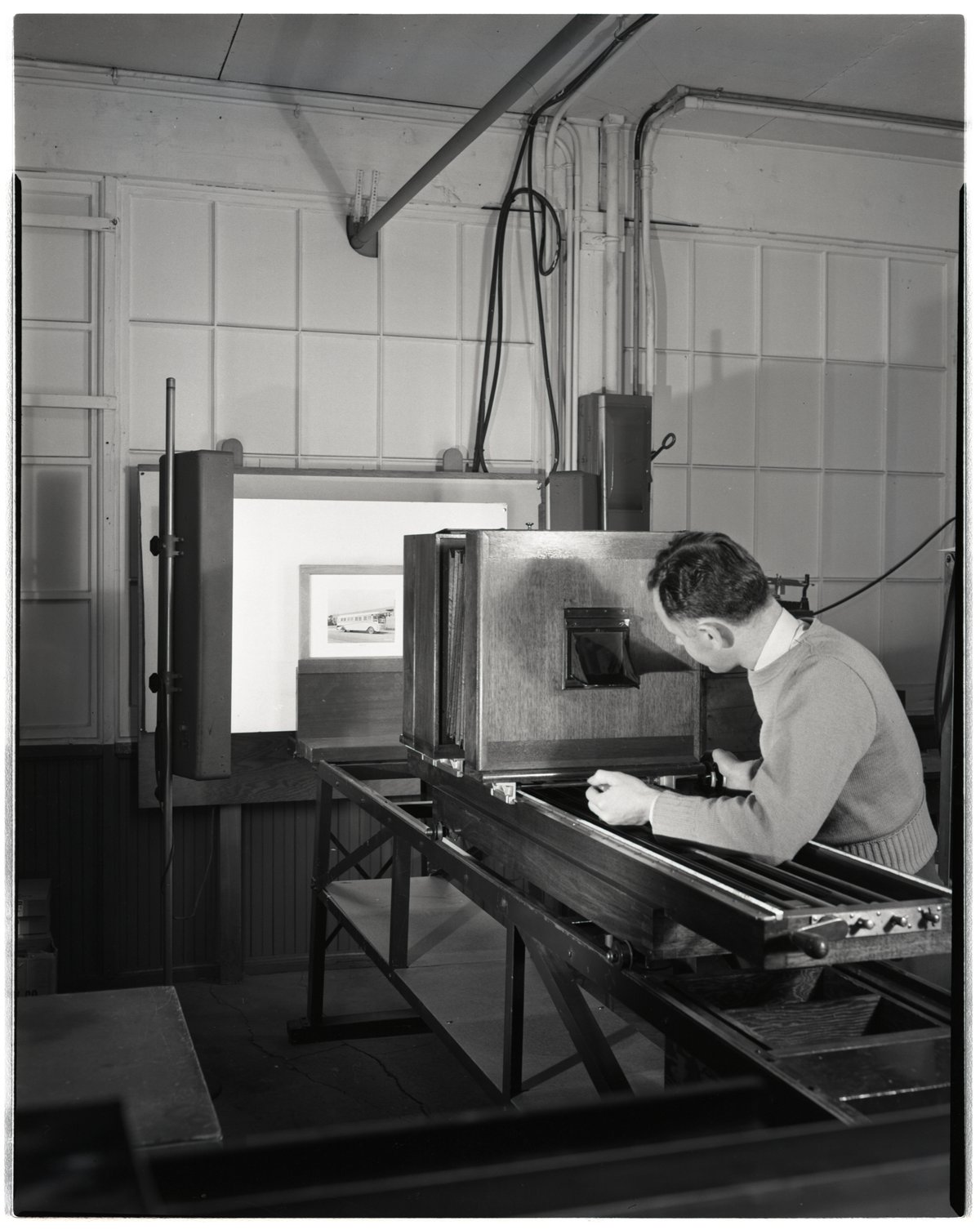 Joe Jardis operating copy camera in Dow Photographic Laboratory ...