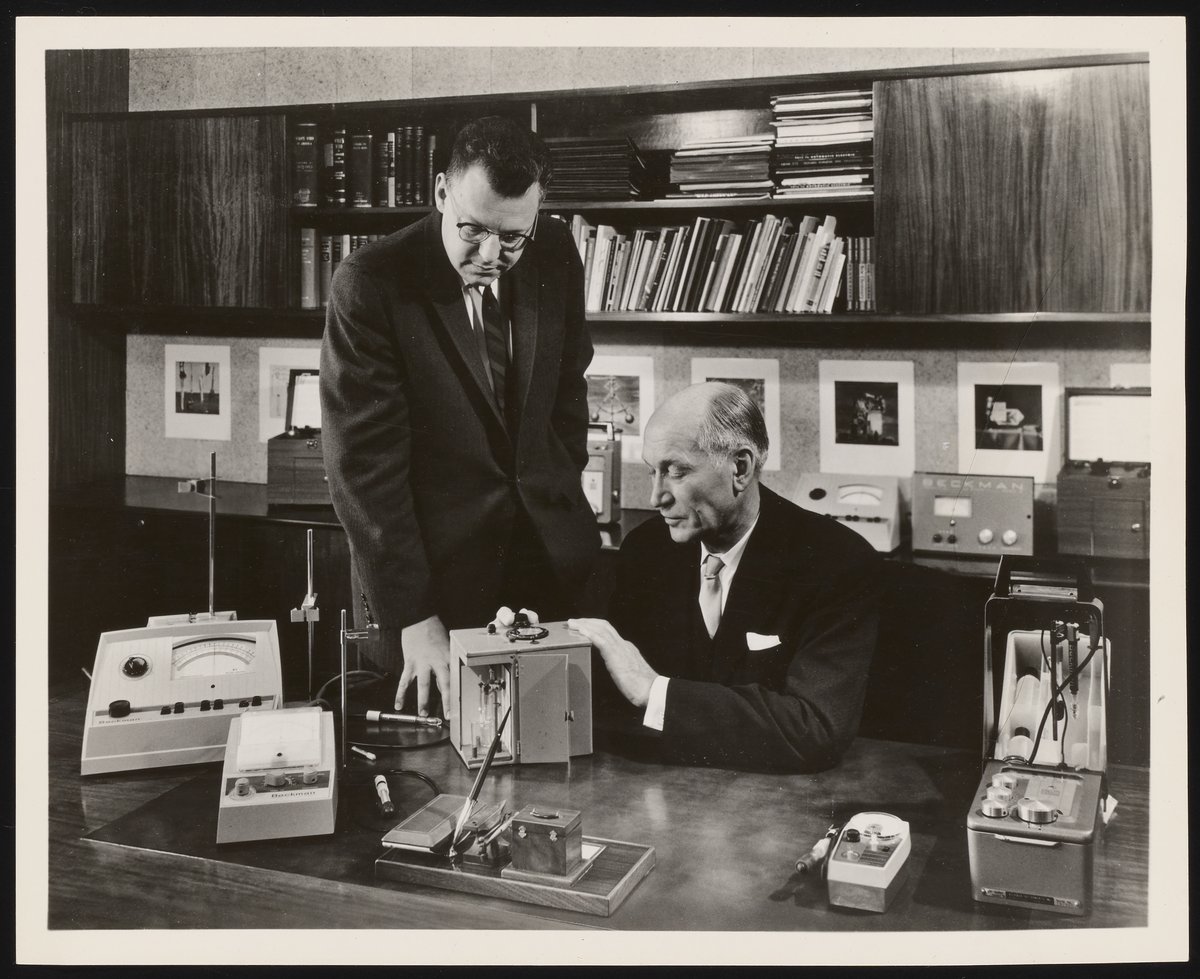 Arnold O. Beckman and an unidentified man with Beckman Instruments ...