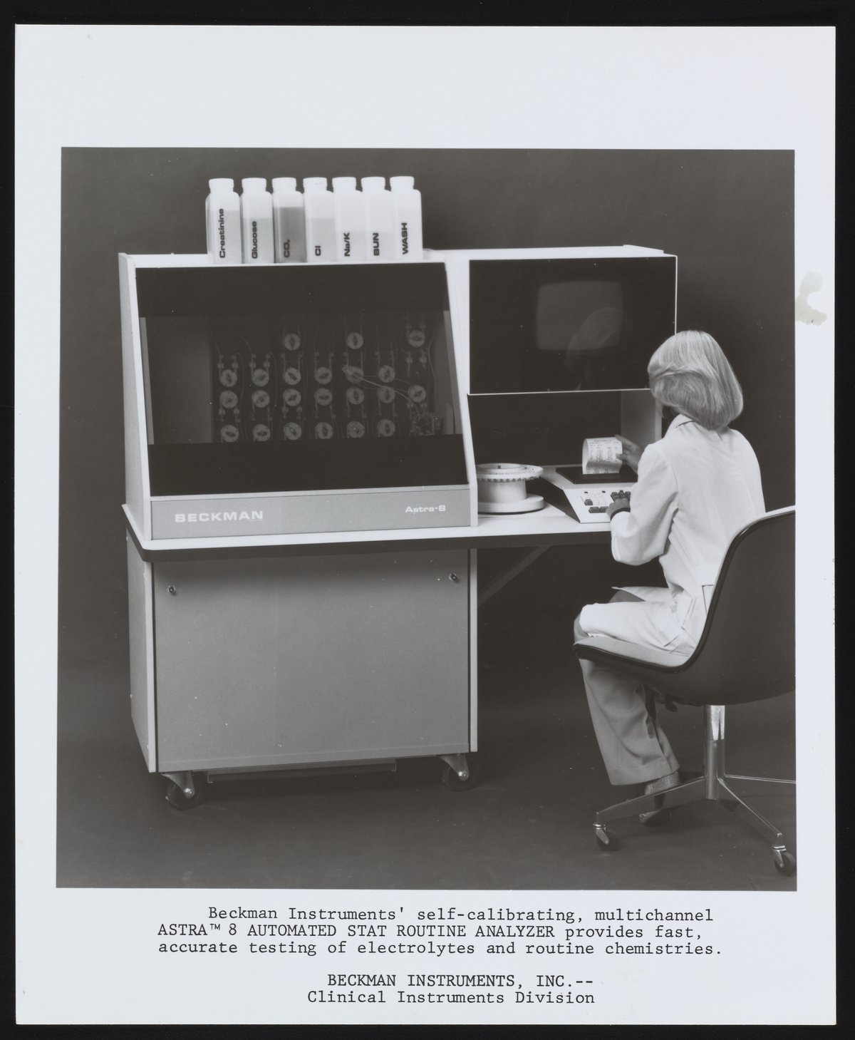 Woman using a Beckman ASTRA 8 Automated Stat Routine Analyzer - Science ...