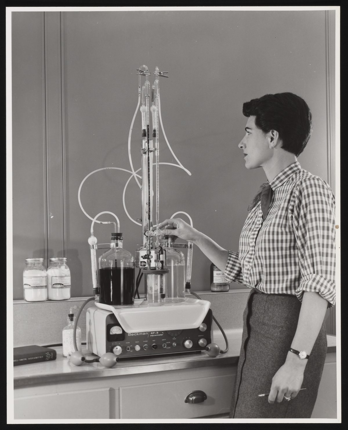Woman using a Beckman Model KF-3 Aquameter - Science History Institute ...