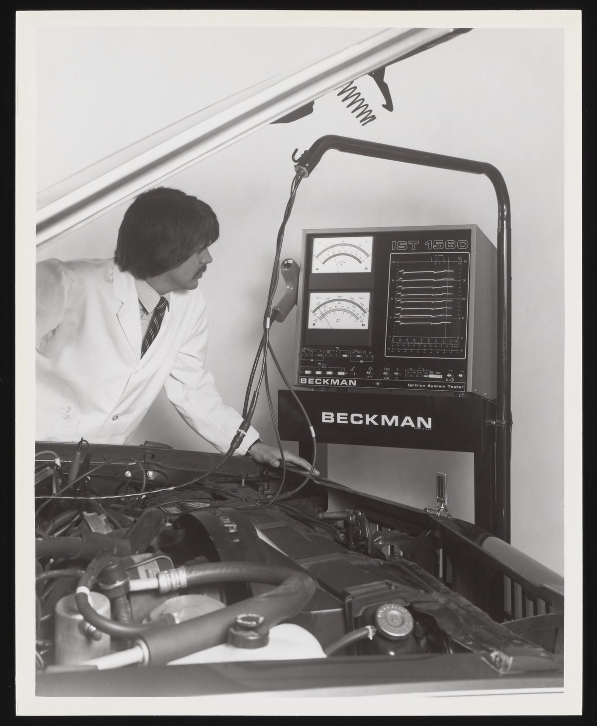 Man using a Beckman Model IST 1560 Ignition System Tester - Science ...