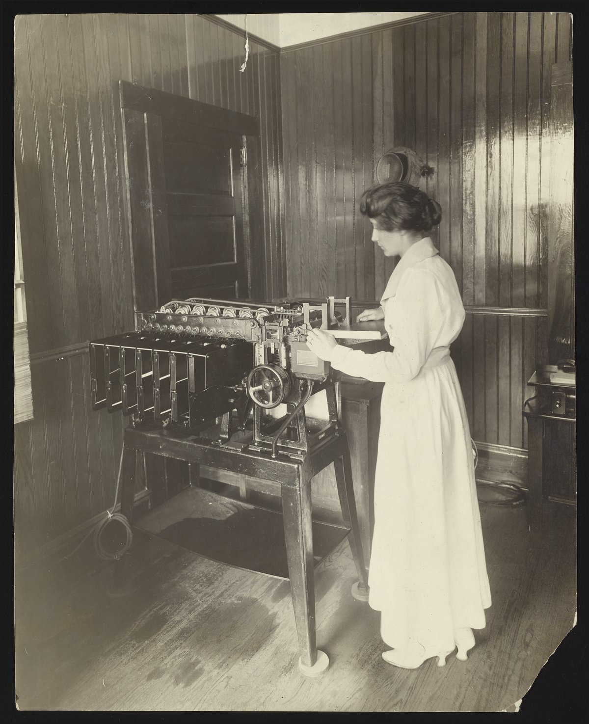 Employee operating sorting machine at Hercules Kenvil plant - Science ...