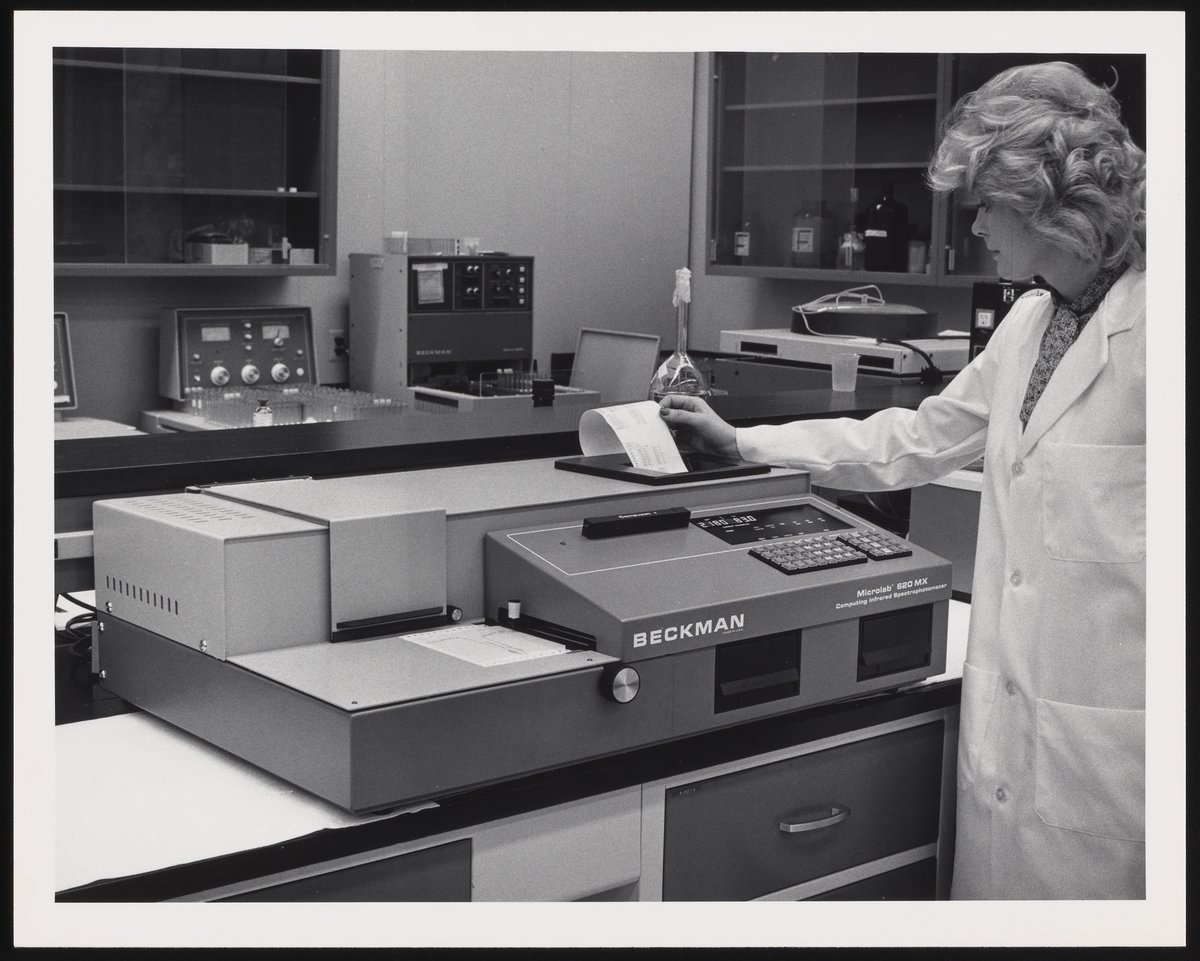 Woman using Beckman Microlab 620 MX Computing Infrared ...