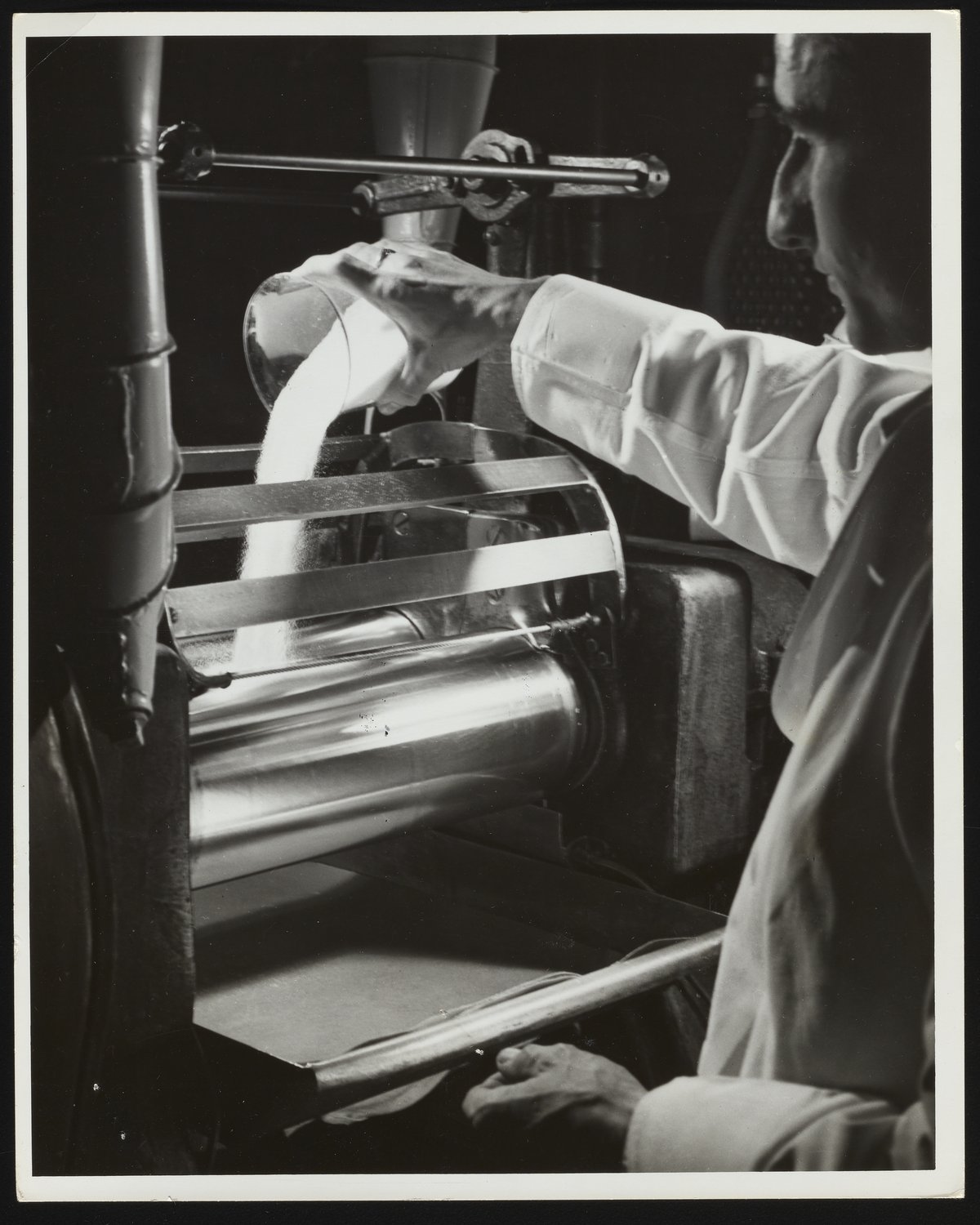 L.F. Strugala using two-roll mill at Hercules Parlin plant - Science ...