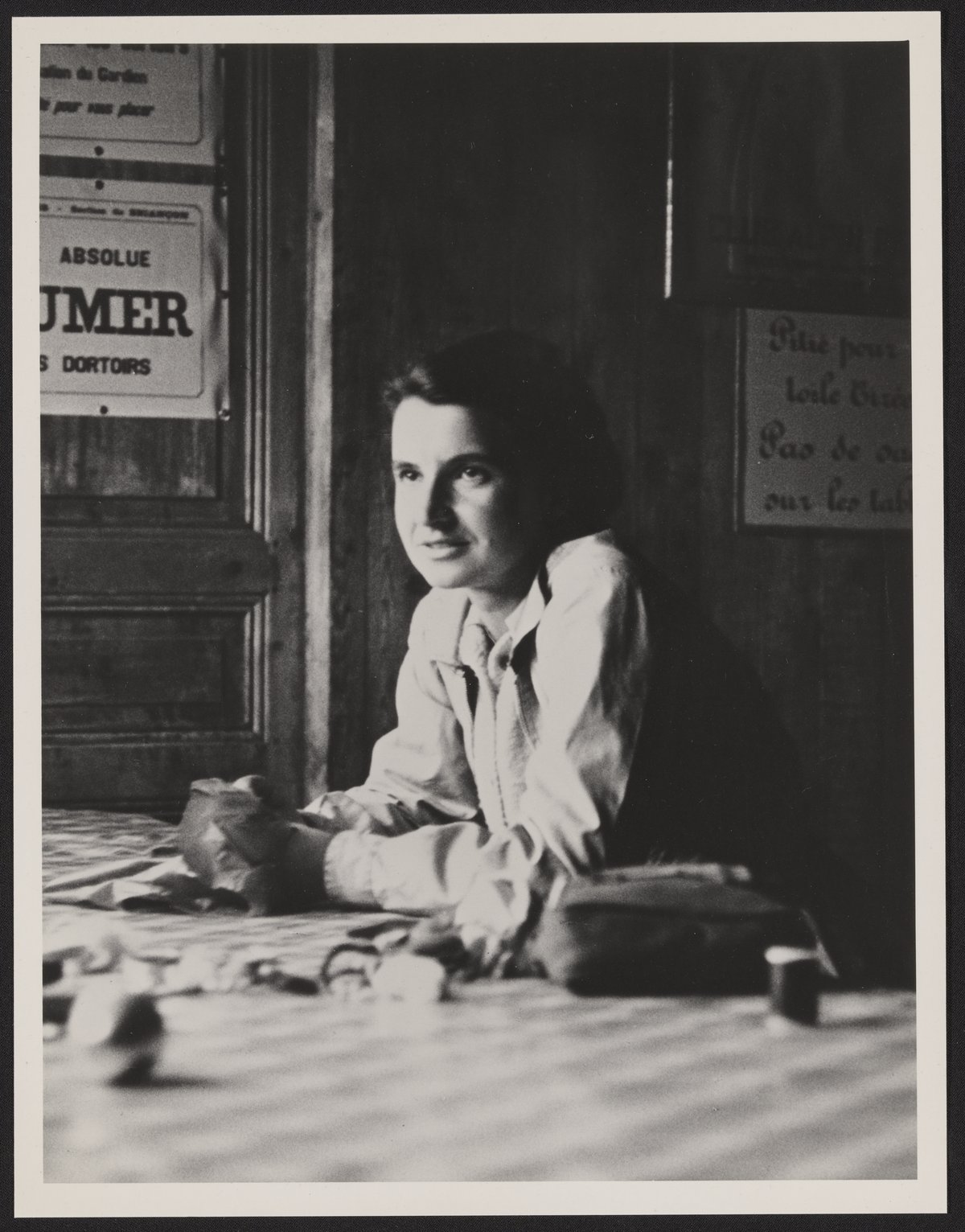 Photograph of Rosalind Franklin sitting at a table - Science History ...