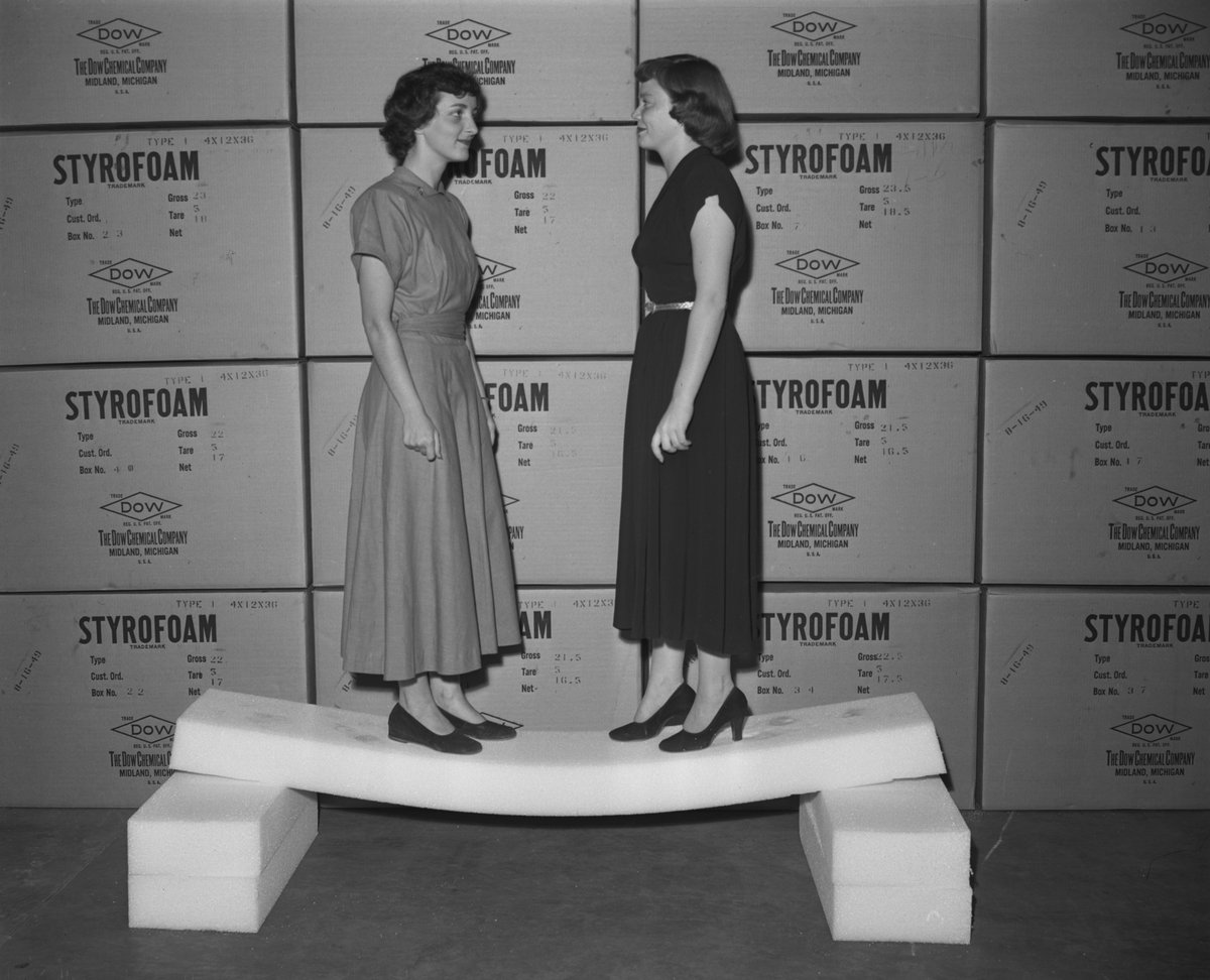 Two models standing on plank of Styrofoam - Science History Institute ...