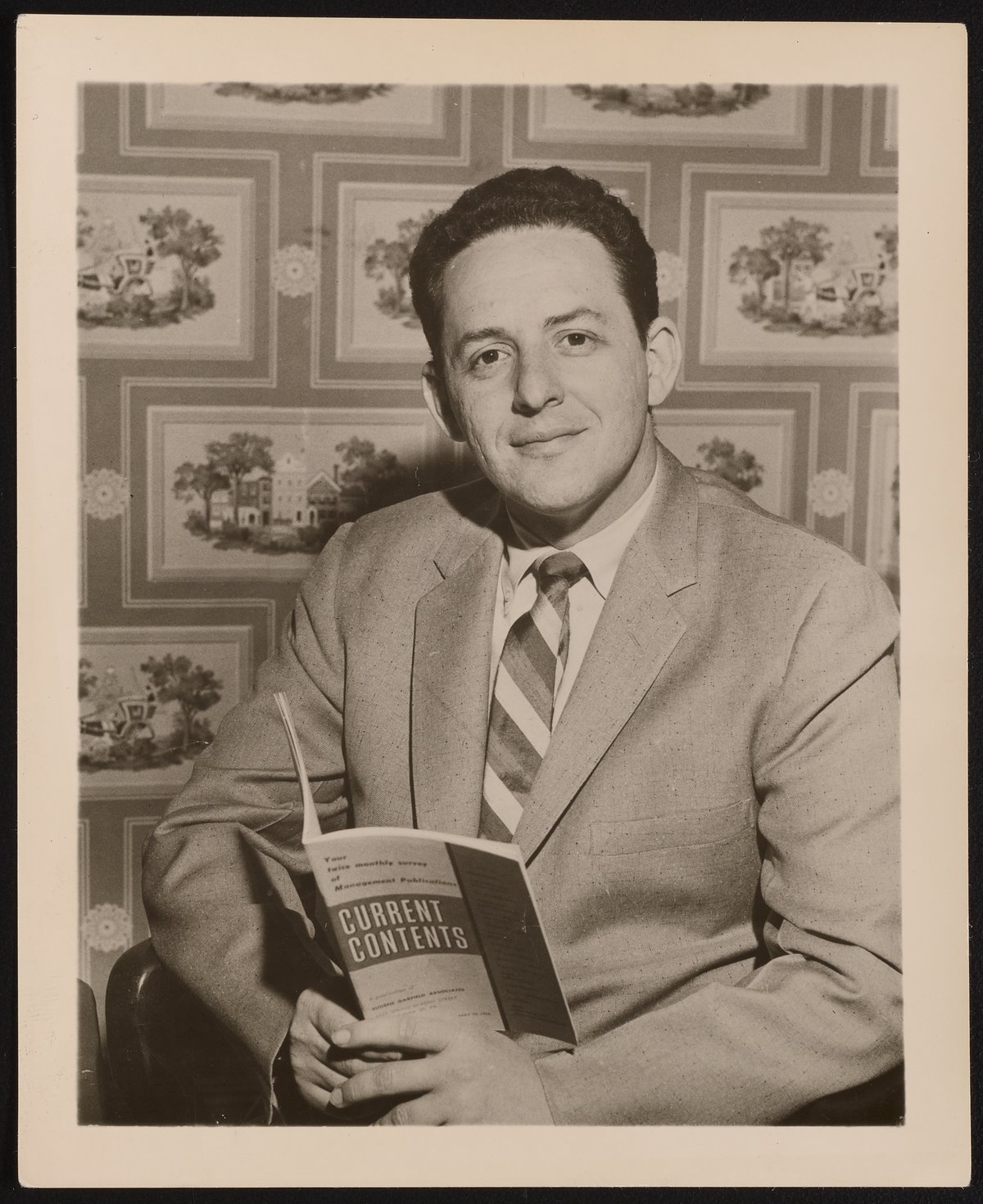 Eugene Garfield posed with a volume of "Current Contents" - Science ...