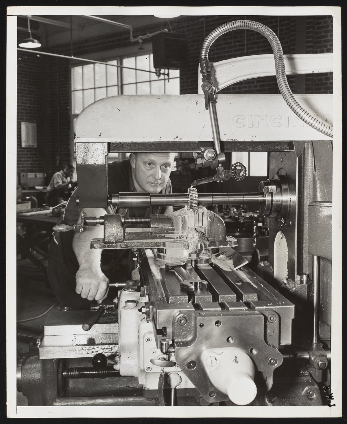 Employee operating milling machine at Hercules Port Ewen plant ...