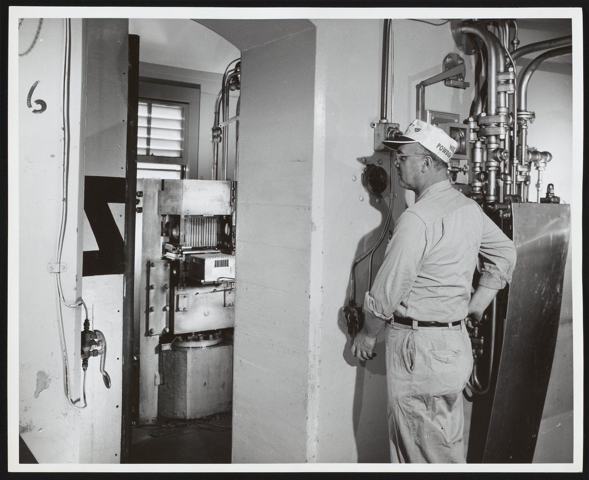 Kenneth Newell operating press machine at Hercules Port Ewen plant ...
