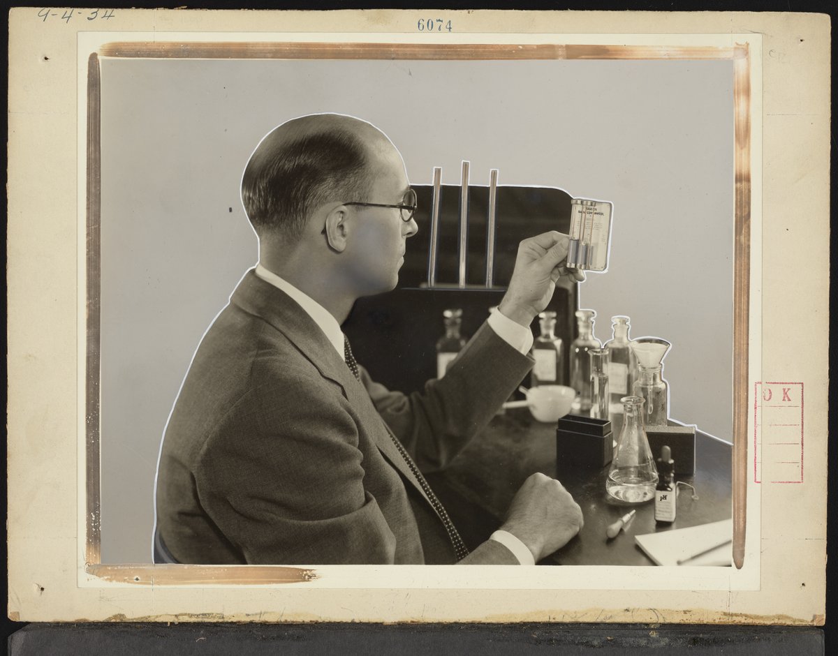 E.P. Fager conducting Dearborn Chemical Company water sample field test ...